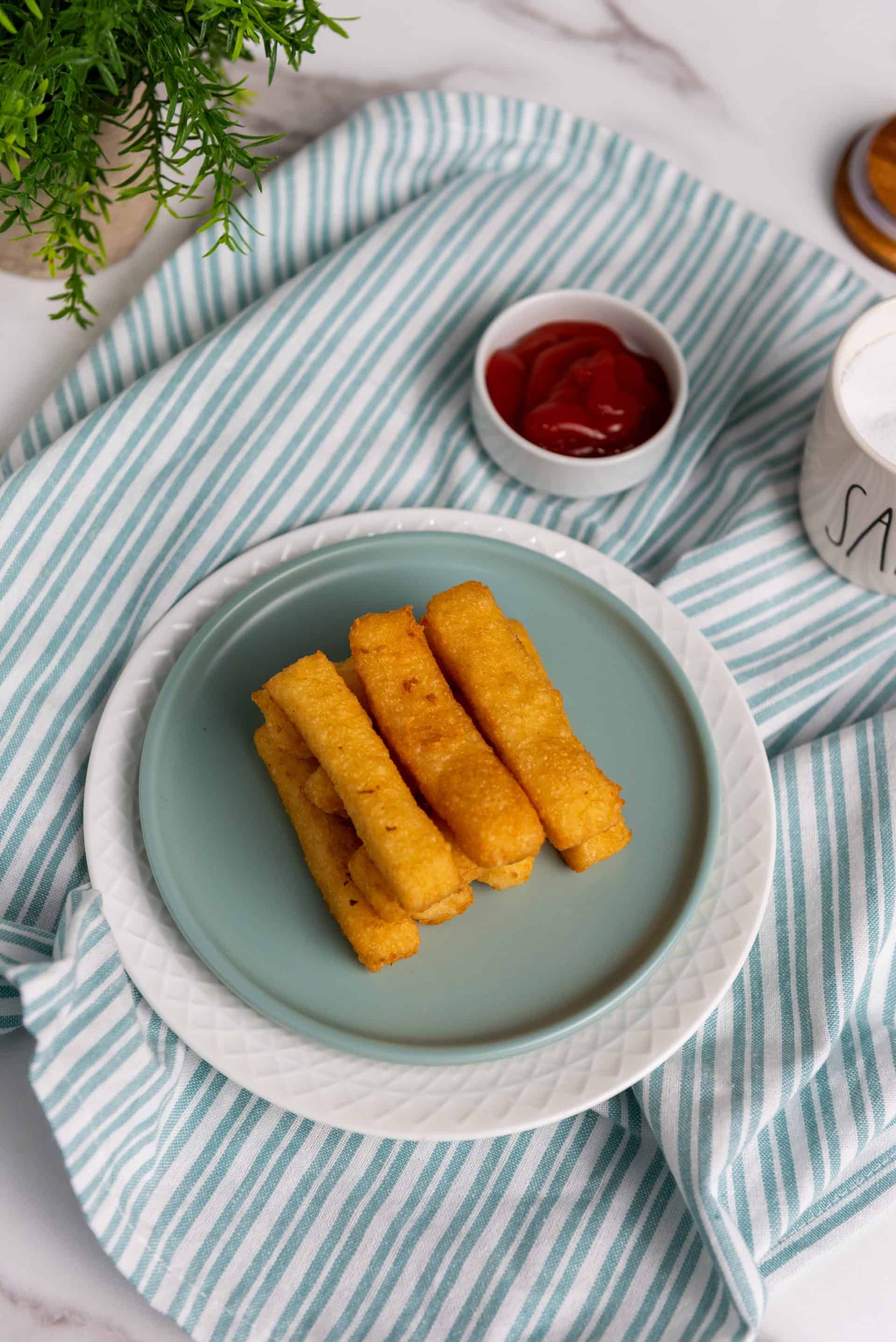 Deliciously Addictive: How to Make Cheesy Potato Sticks at Home - Cream ...